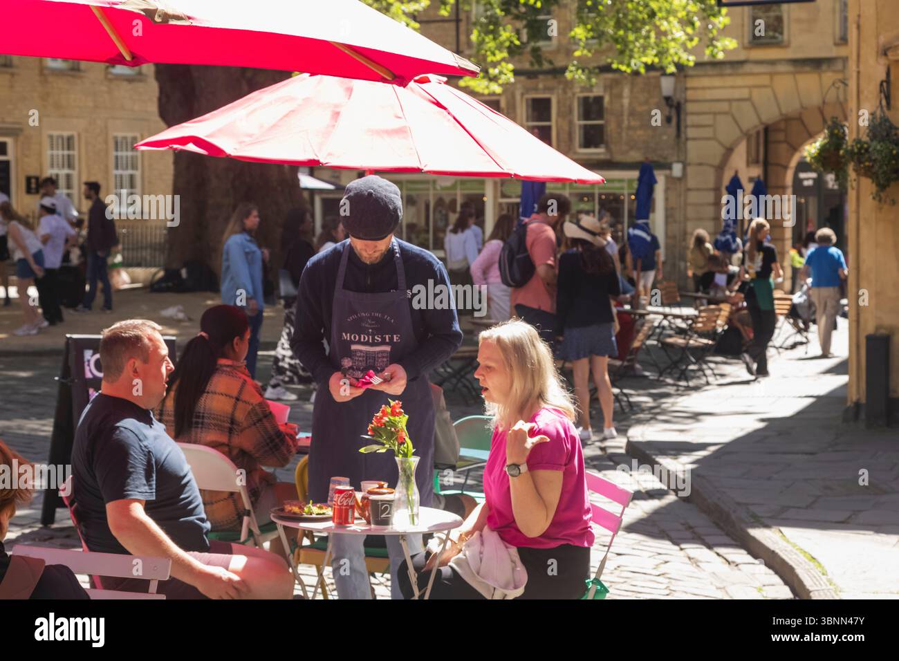England, Somerset, Bath, Abbey Green, Couple Dining Alfresco Stock ...
