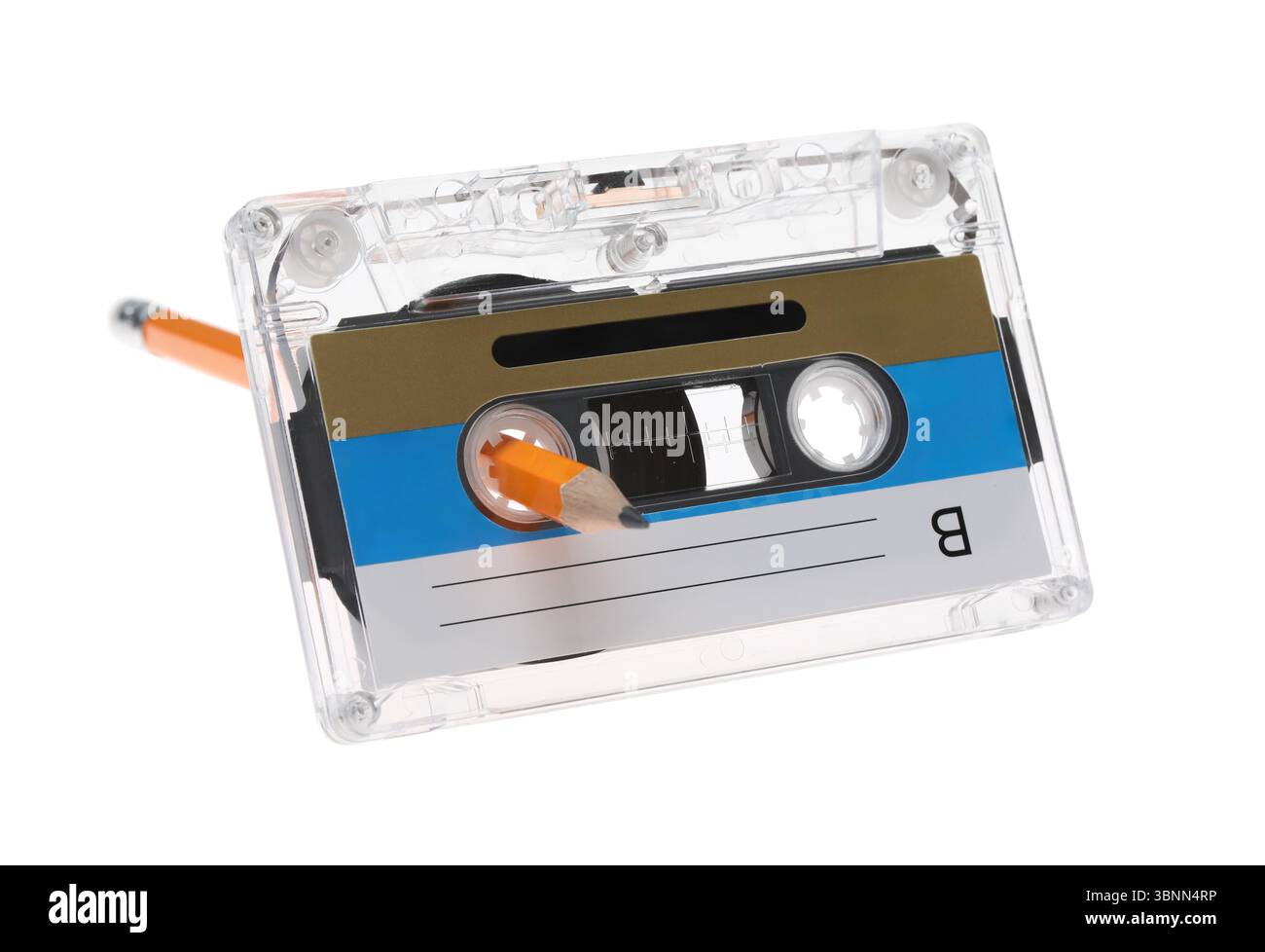 Rewinding audio cassette with pencil isolated on white Stock Photo - Alamy