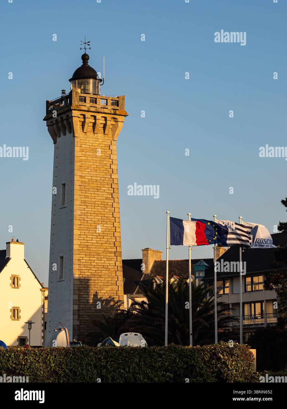 Roscoff, France – May 19, 2025: The lighthouse at the port of Roscoff ...