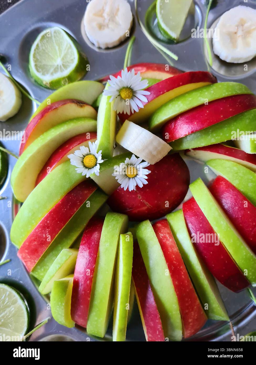 Freshly sliced green limes red hi-res stock photography and images - Alamy