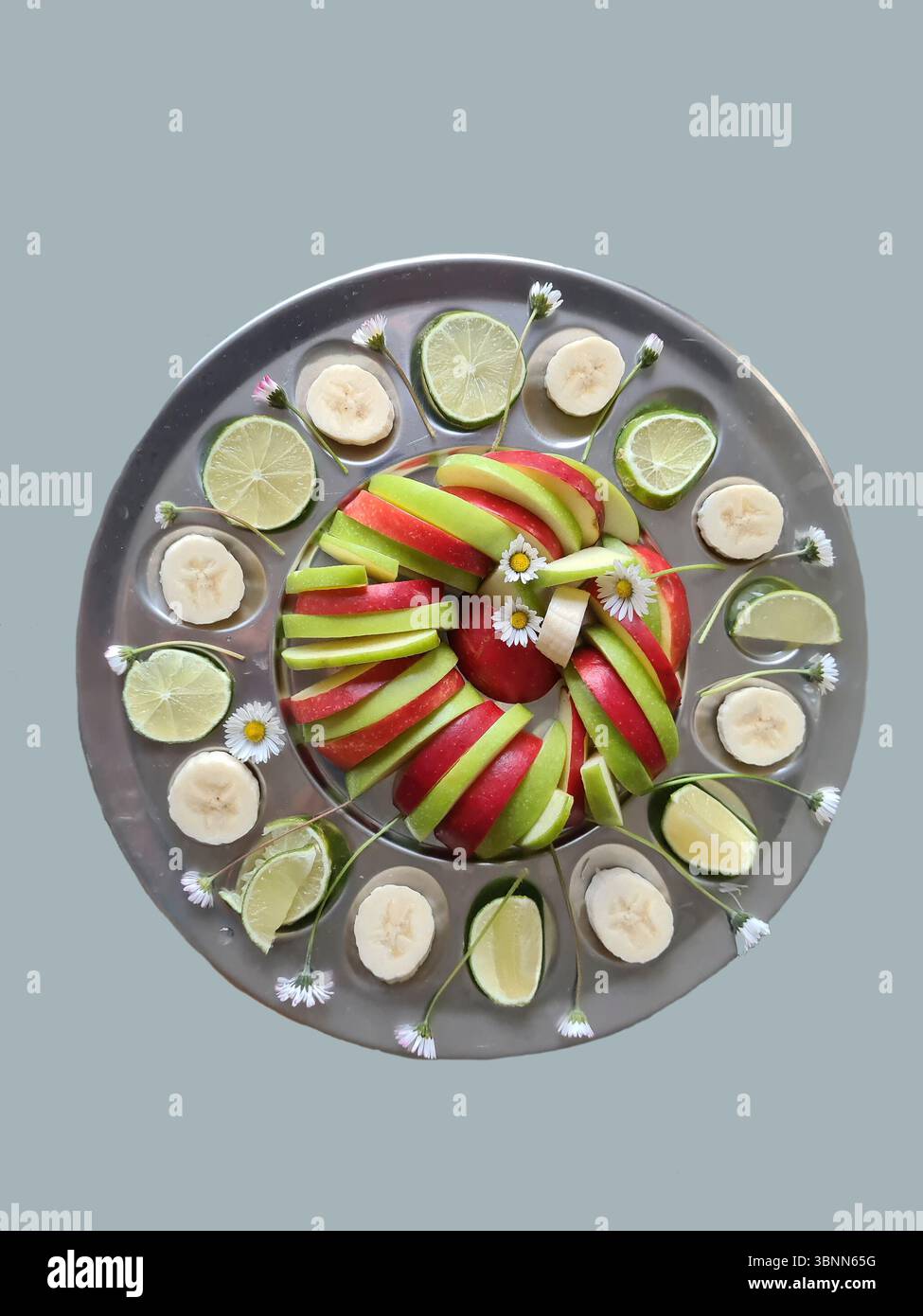 Freshly sliced green limes red hi-res stock photography and images - Alamy