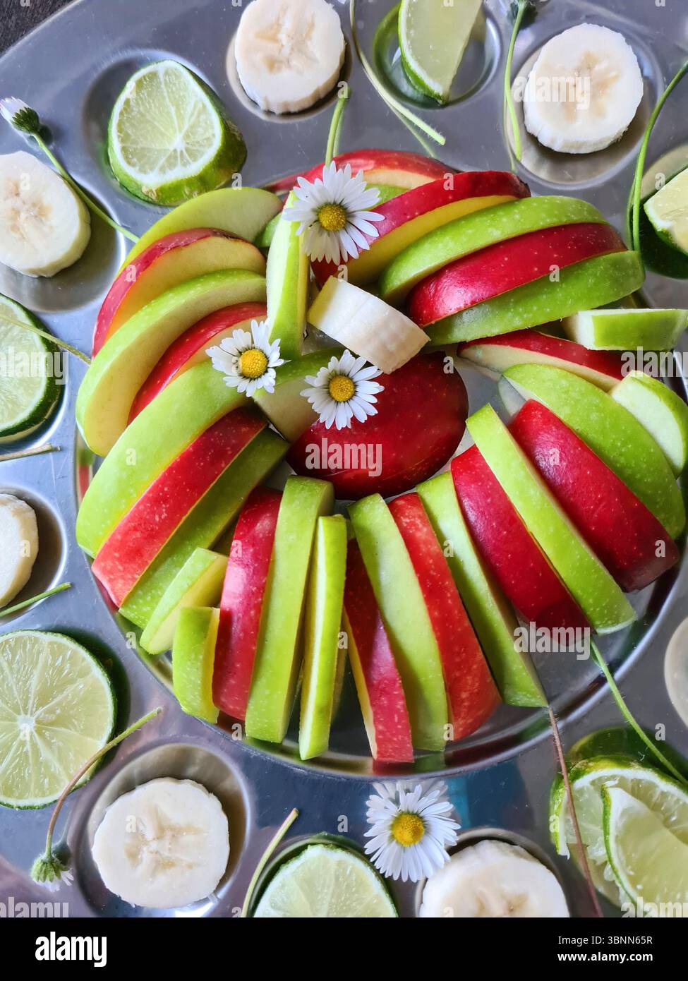 Fresh fruit on serving plates, vitamin-rich nutrition, healthy freshly ...