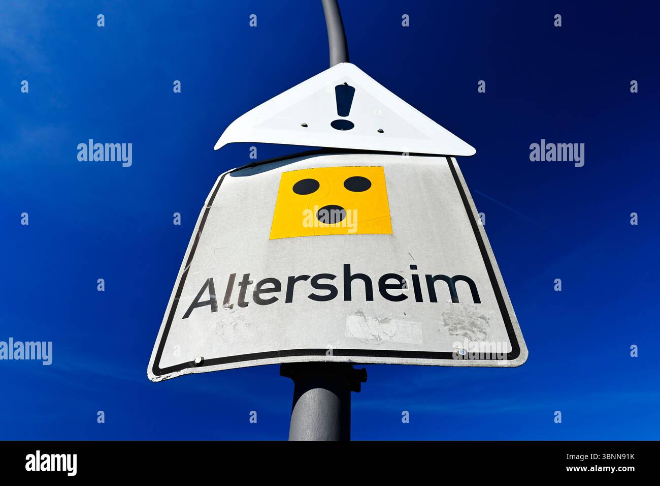 Danger sign for retirement home with traffic safety sign in ...