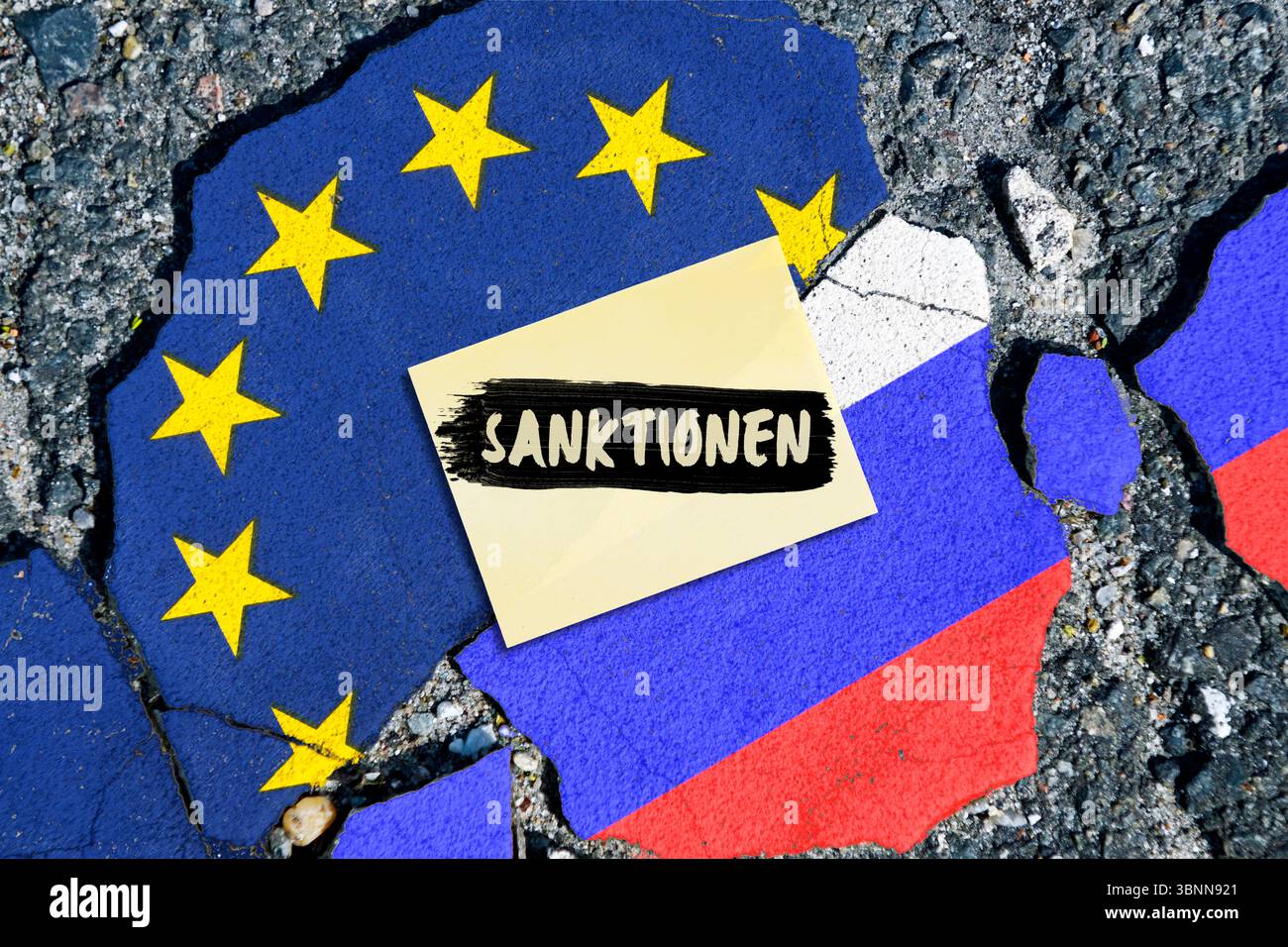 Flags of EU and Russia on broken ground and note with the inscription ...