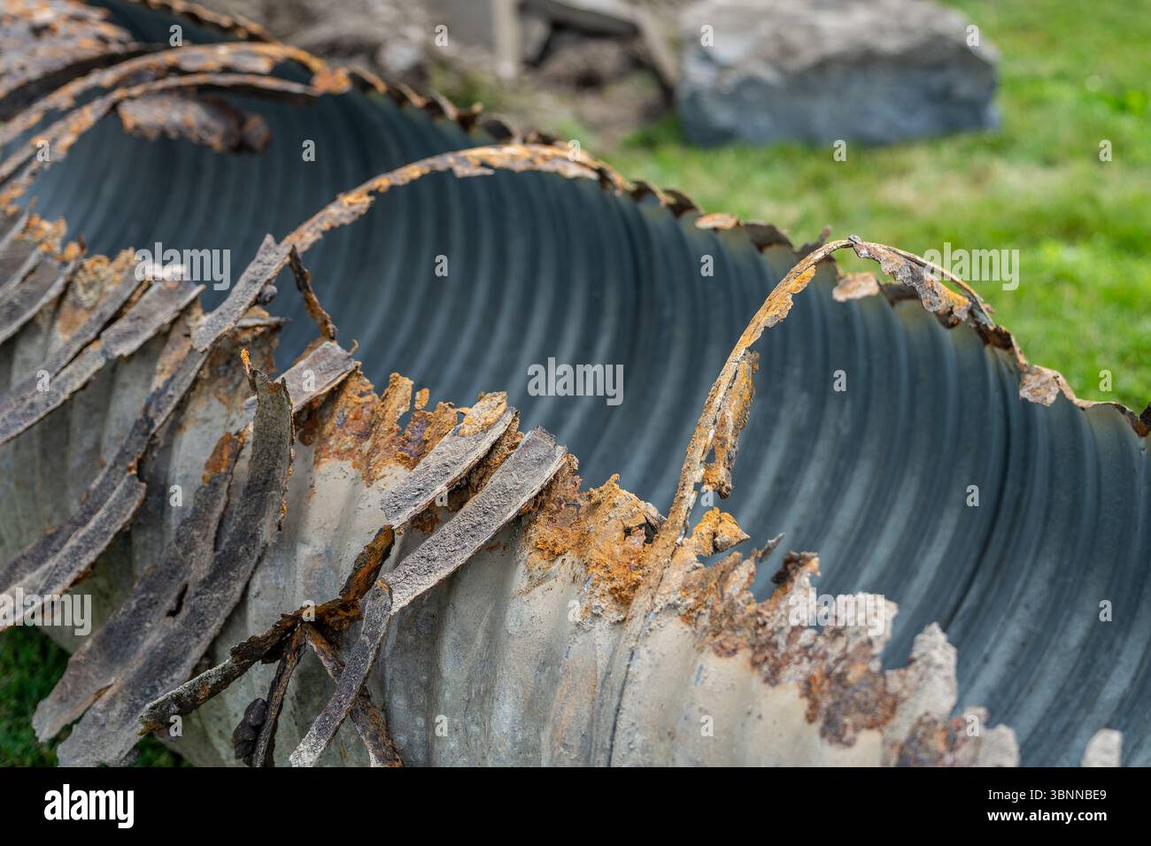 Infrastructure photo of rusted out corrugated metal pipe, CMP, drainage ...