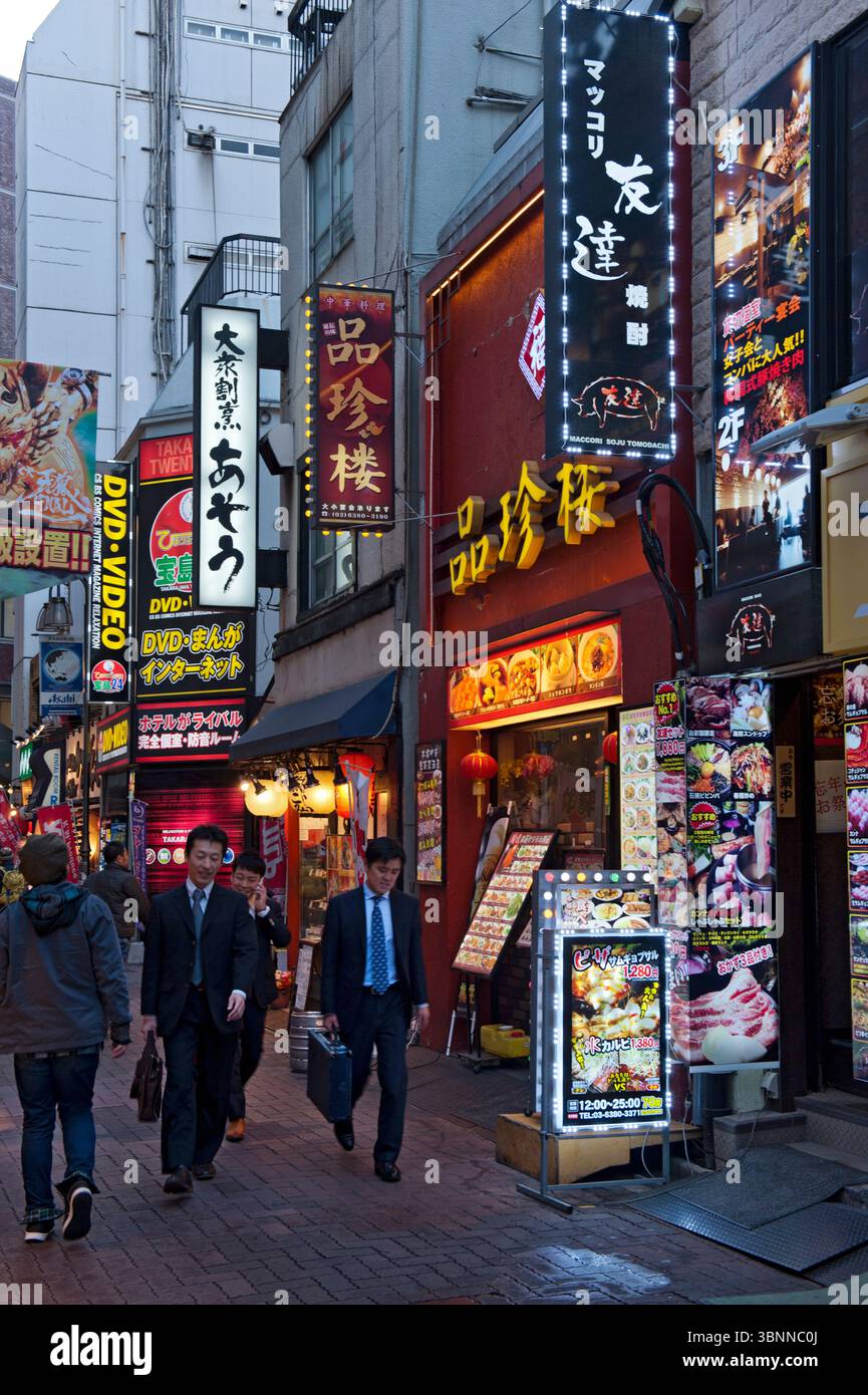 Kabukicho building facades glow in the night with neon signs, the ...