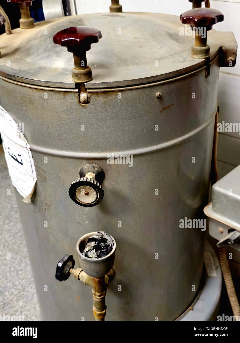 Cairo, Egypt, June 30 2025: an old medical autoclave, a device that ...