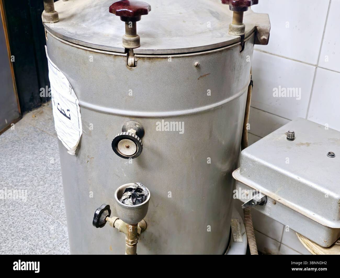 Cairo, Egypt, June 30 2025: an old medical autoclave, a device that ...