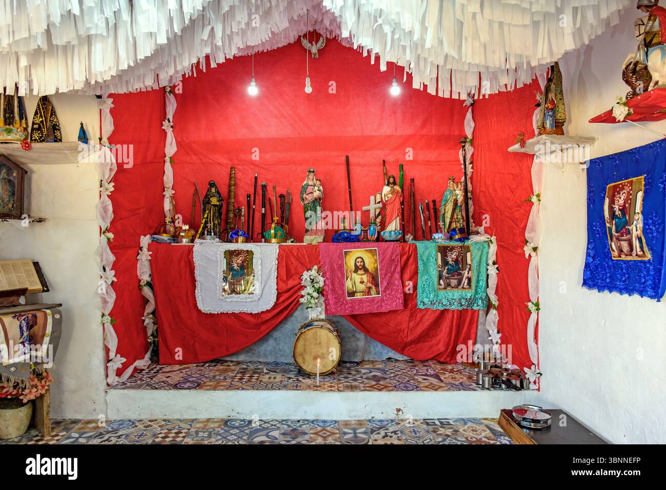 Altar in the interior of Brazil with objects, images of saints and ...