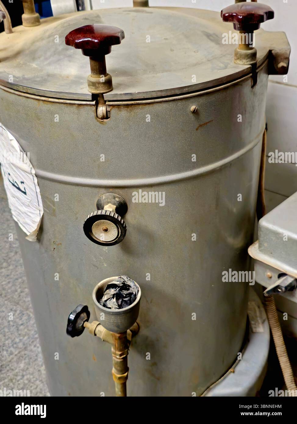 Cairo, Egypt, June 30 2025: an old medical autoclave, a device that ...