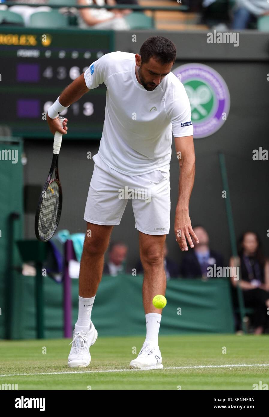 Marin Cilic in action against Jack Draper on day four of the 2025 Wimbledon Championships at the ...