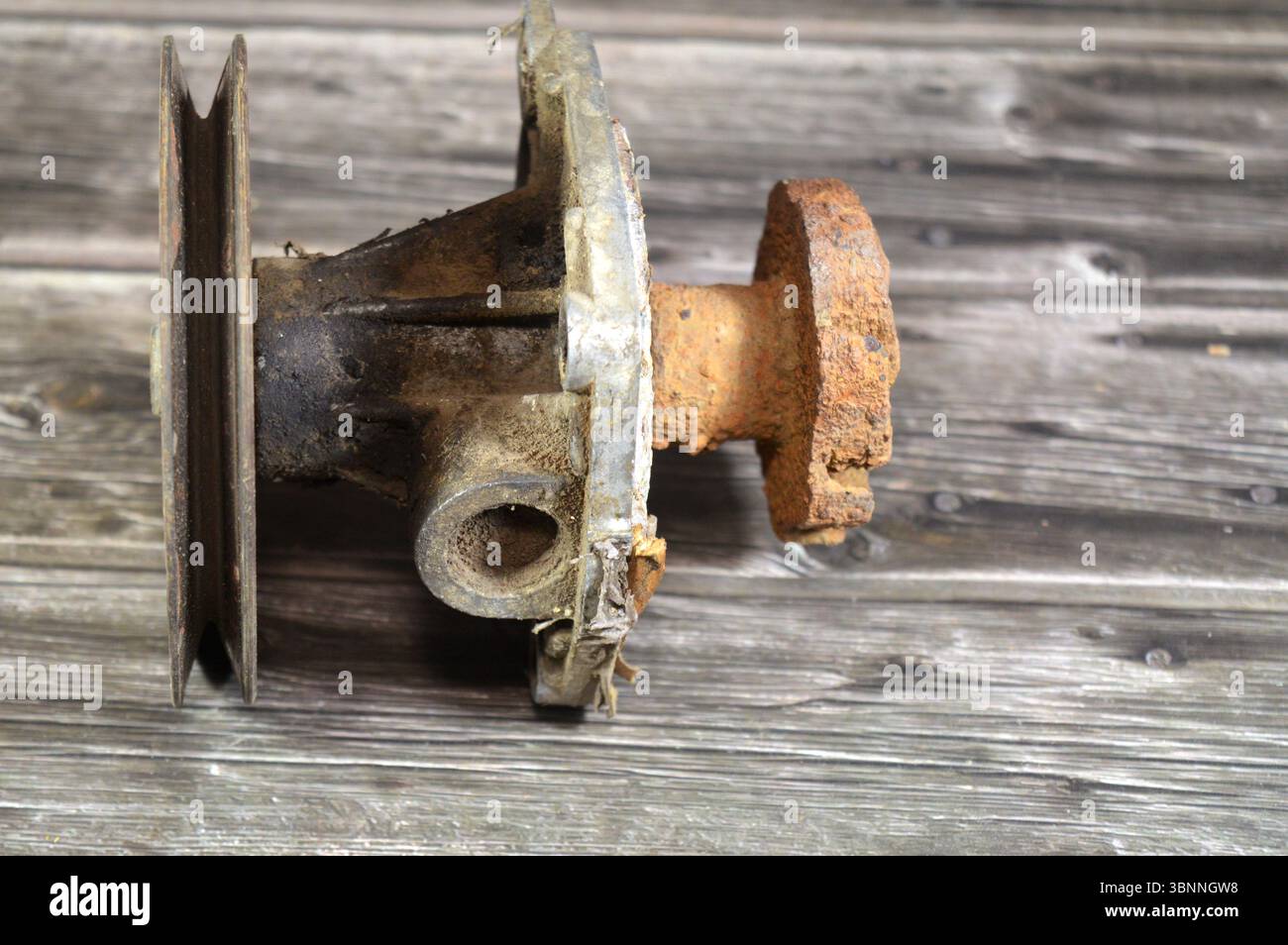 a used old rusty car water pump, water pump is vital to a car engine’s ...