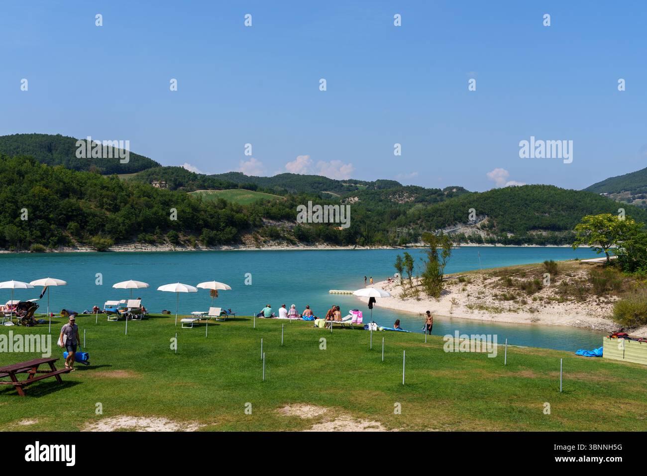 Popular beach on the banks of lake Fiastra in the marche region of ...