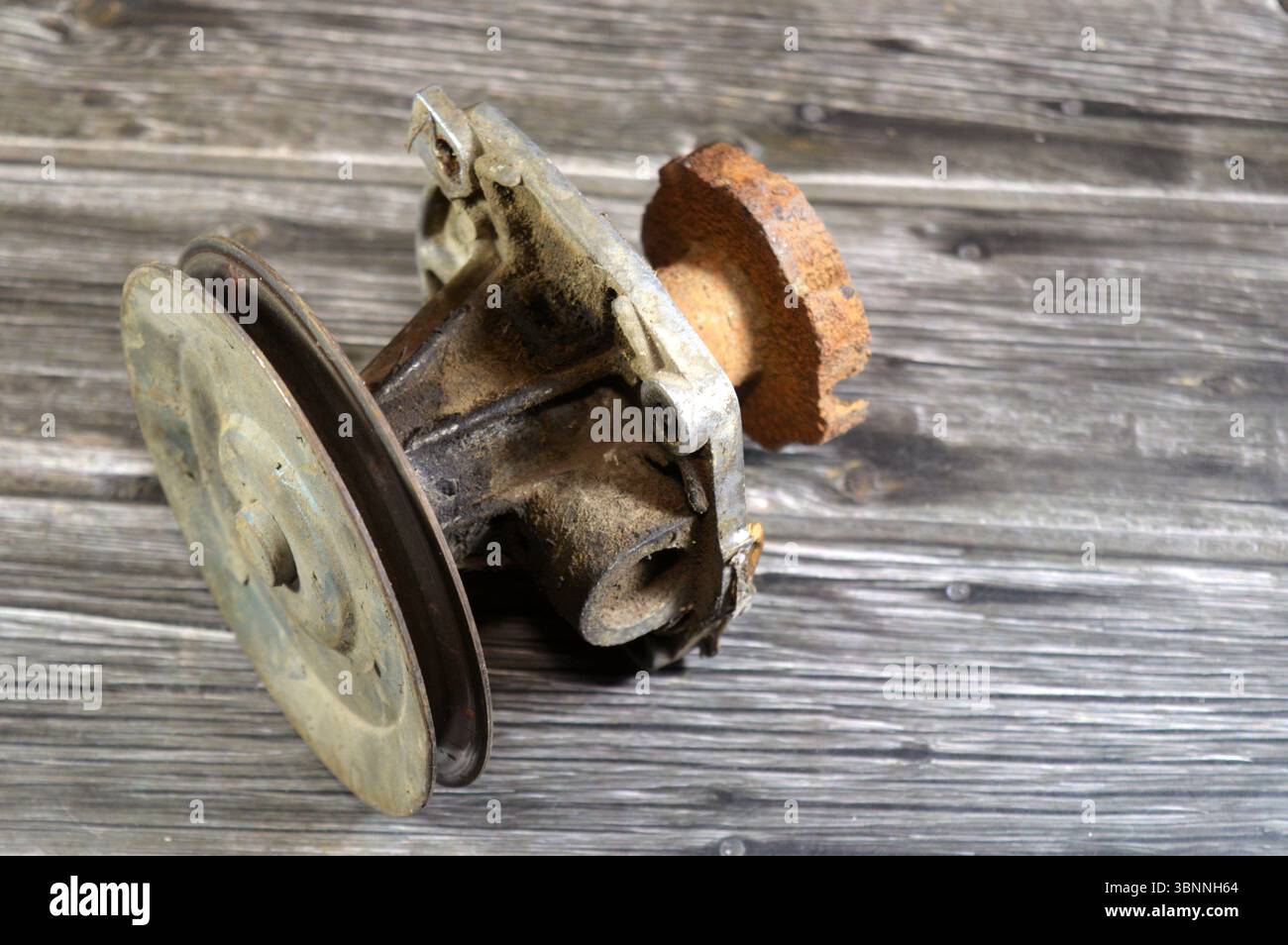 a used old rusty car water pump, water pump is vital to a car engine’s ...