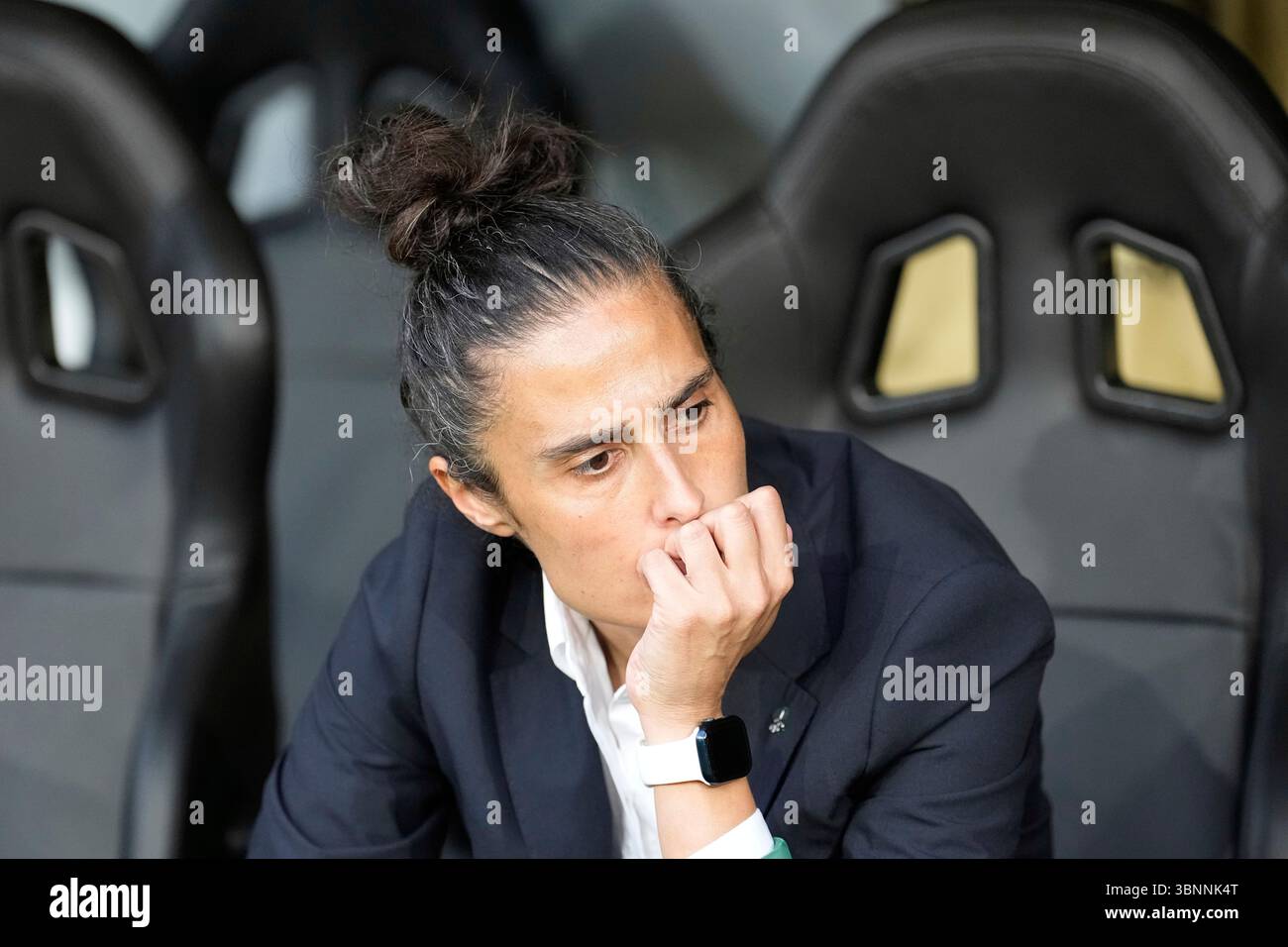 Spain head coach Montserrat Tome sits on the bench at the start of the ...
