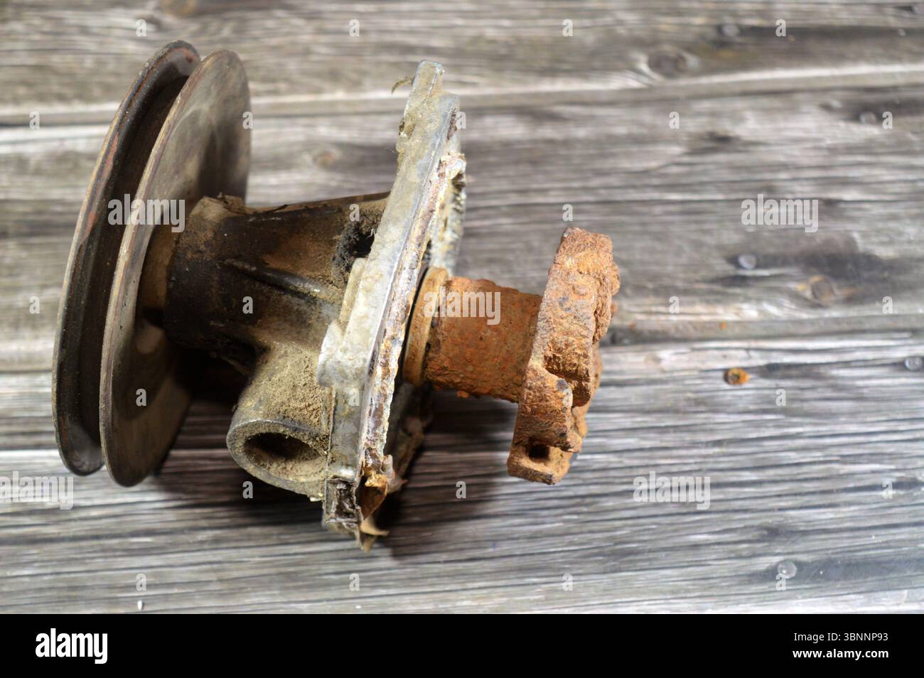 a used old rusty car water pump, water pump is vital to a car engine’s ...