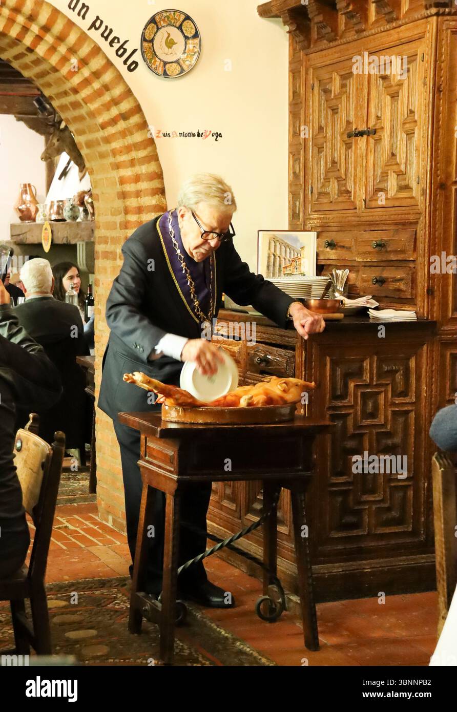 Segovia, Spain- April 6, 2025: The Famous Candido chef serving suckling ...