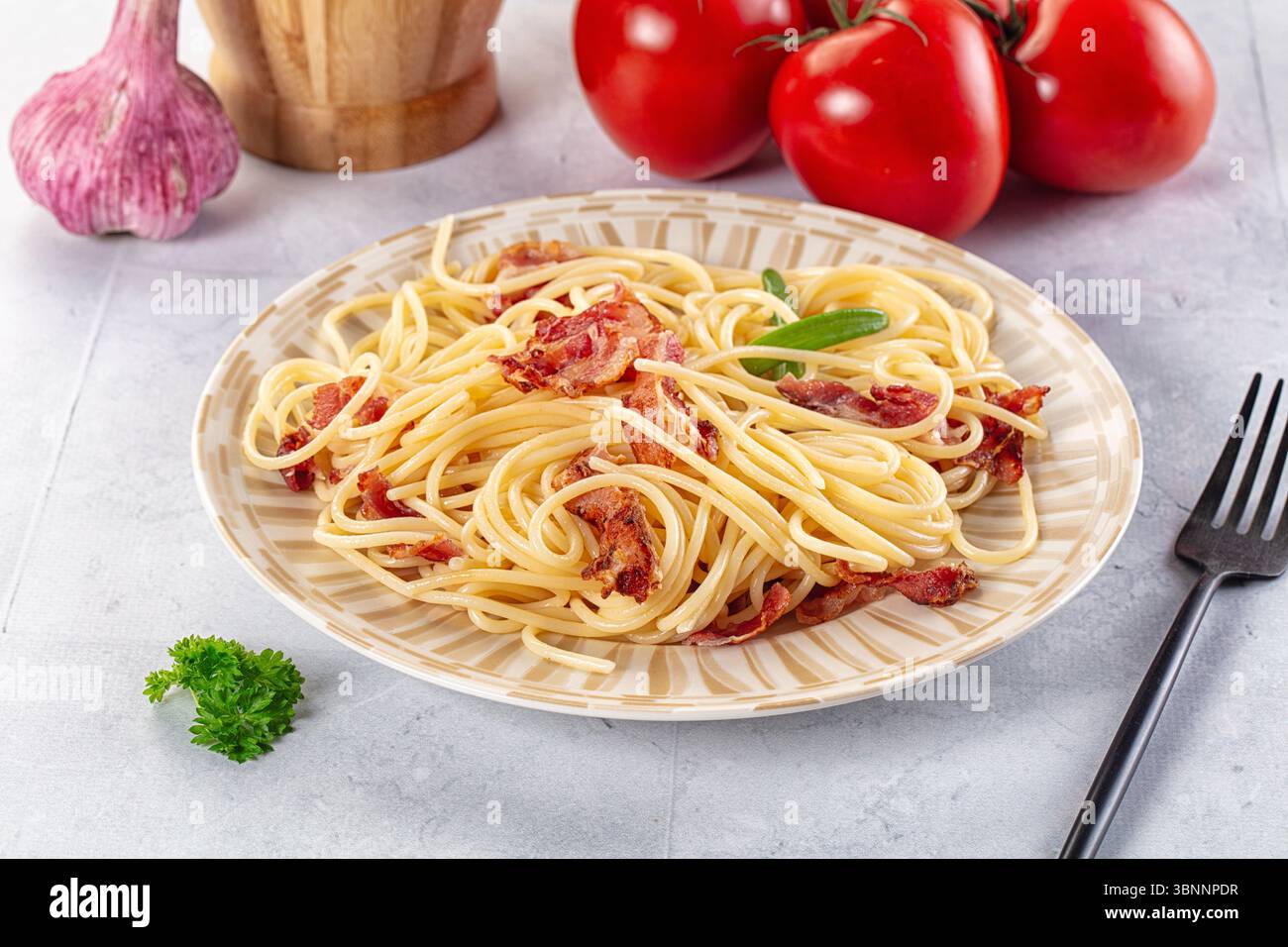 Italian pasta spaghetti with roasted bacon Stock Photo - Alamy