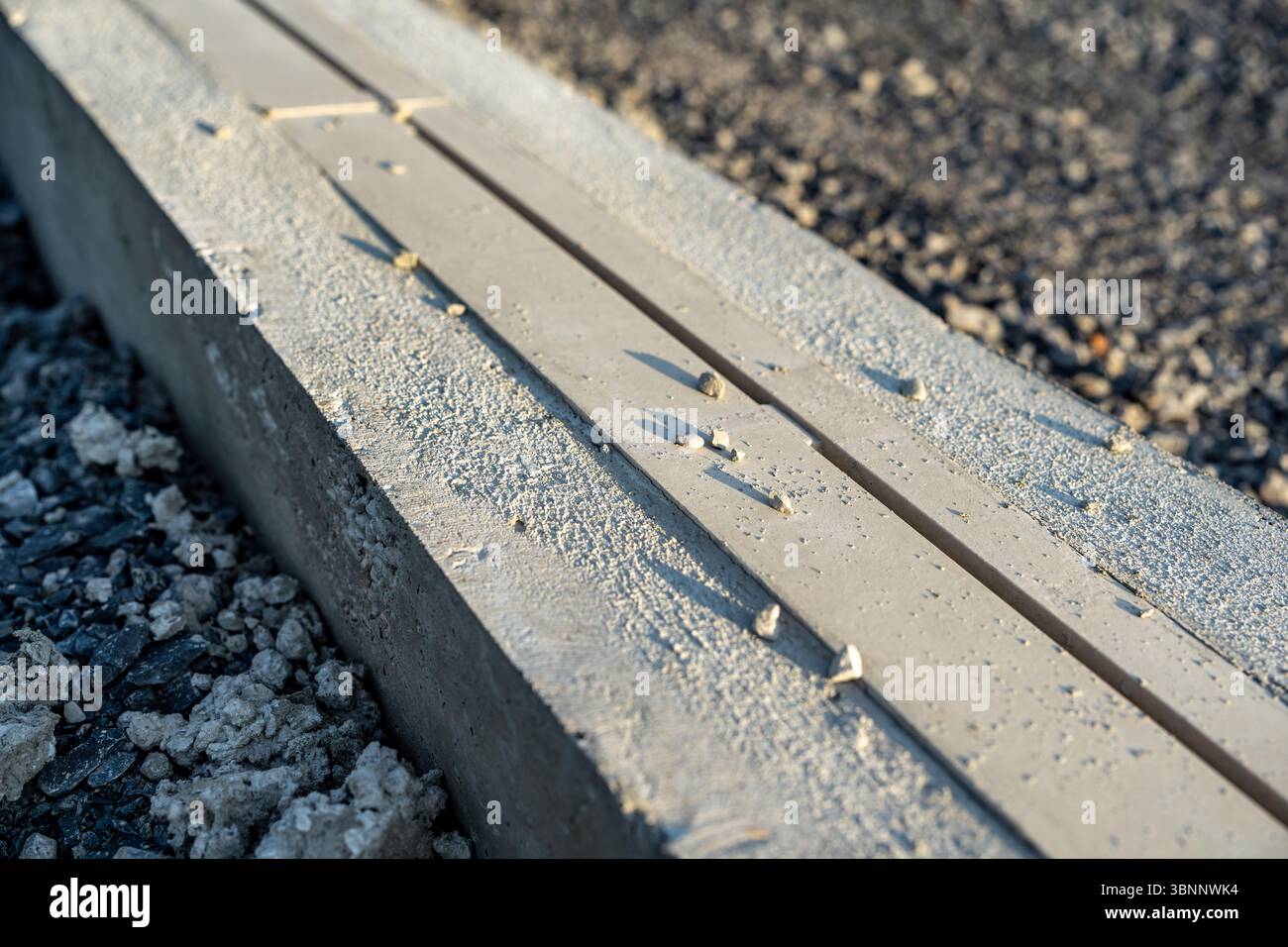 Construction photo of new running track slot drain in concrete Stock ...