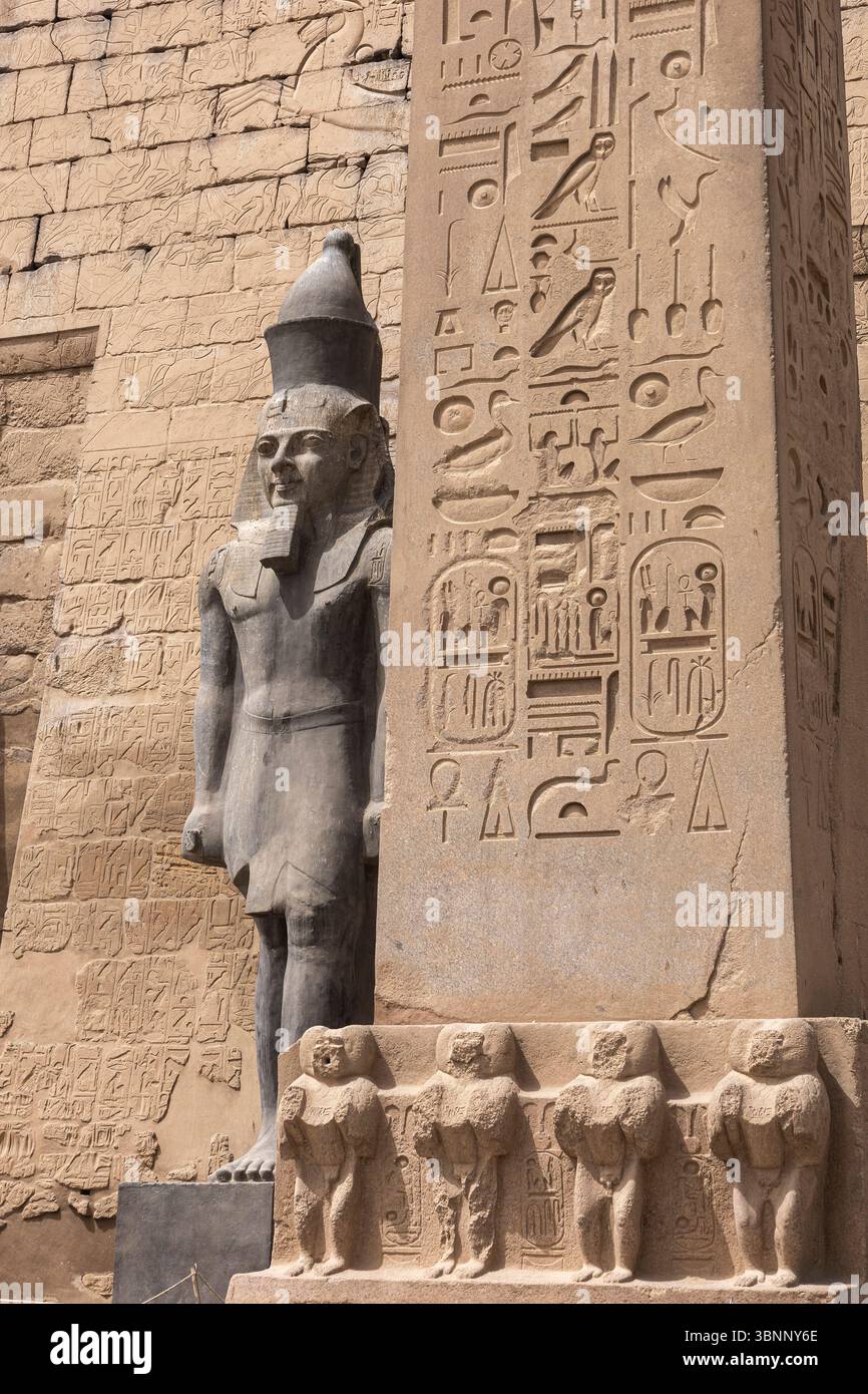 Luxor temple, first pylon(tower gate), obelisk, colossal statues of ...