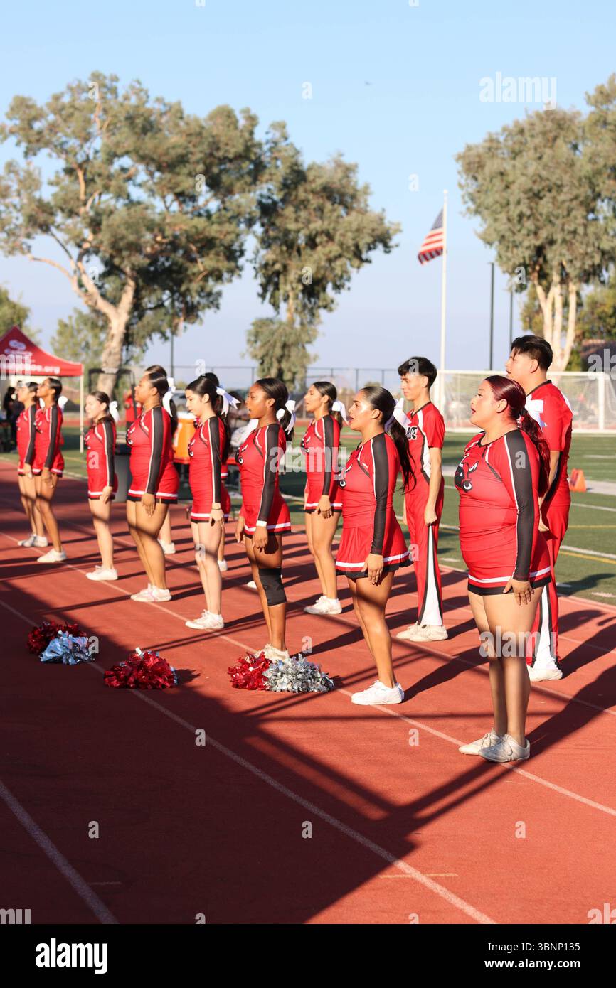 The Pierce cheer team practices before a football game between the ...