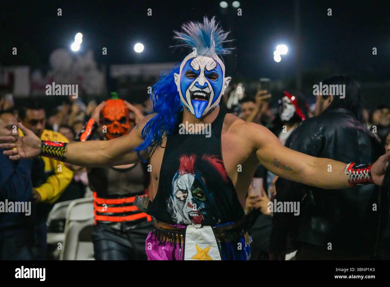 Ensenada, Baja California, Mexico. 27th June, 2025. Masked wrestlers perform during a lucha ...