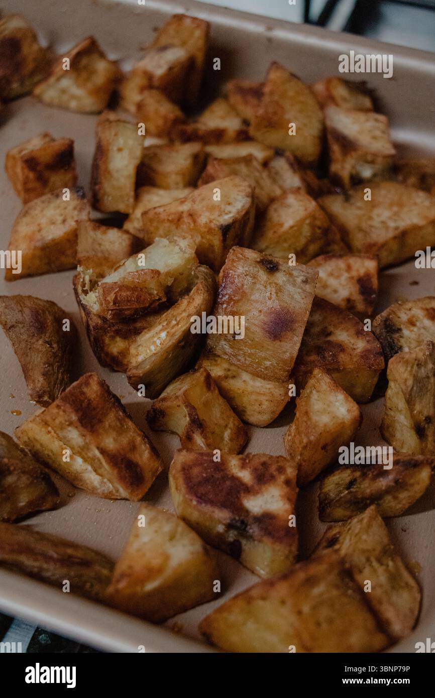 Roasted Diced Potatoes on Tray Stock Photo - Alamy