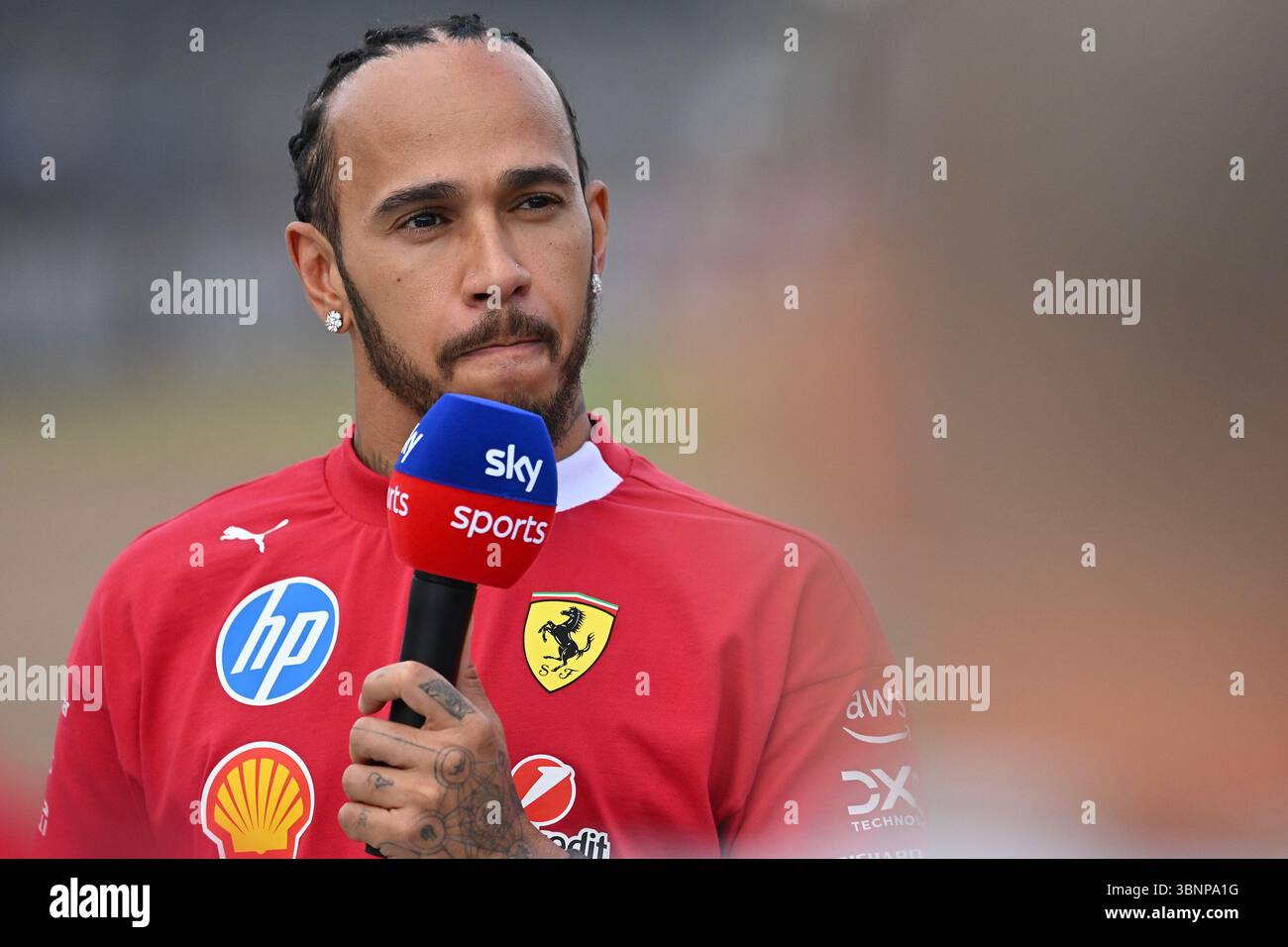 NORTHAMPTON, ENGLAND - JULY 3: Lewis Hamilton of Great Britain and ...