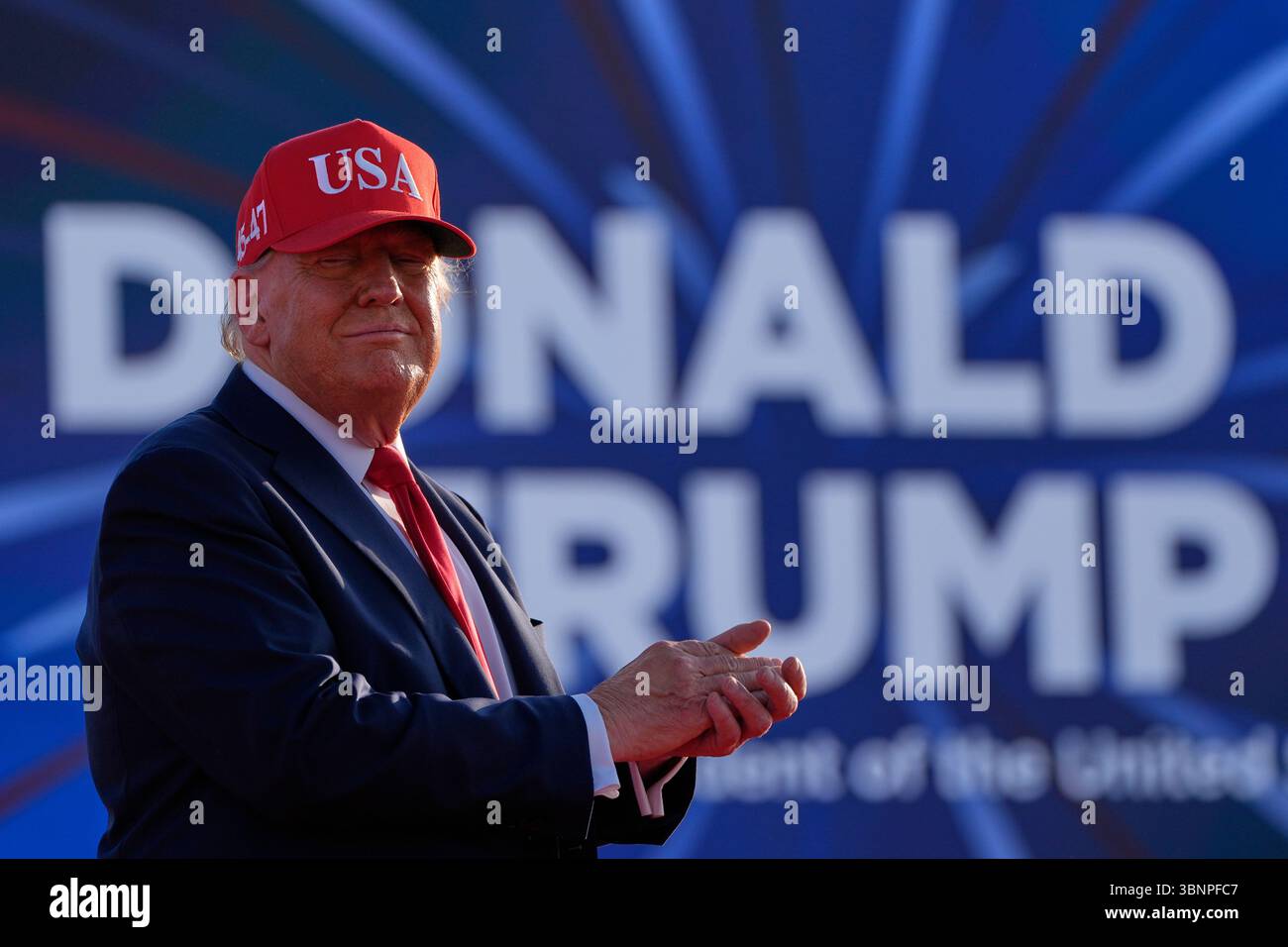 President Donald Trump arrives to speak at a rally at the Iowa State ...