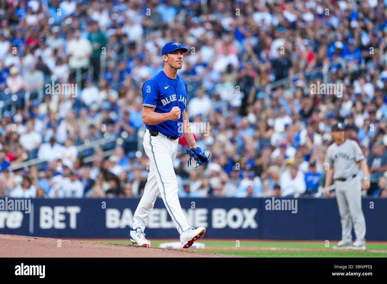 Toronto Blue Jays pitcher Chris Bassitt (40) reacts to a final strike ...
