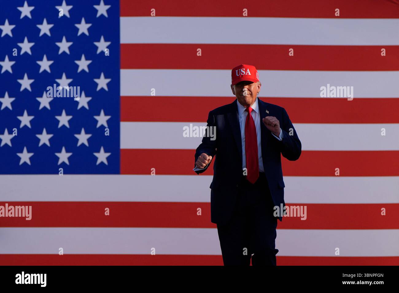 President Donald Trump arrives to speak at a rally at the Iowa State ...