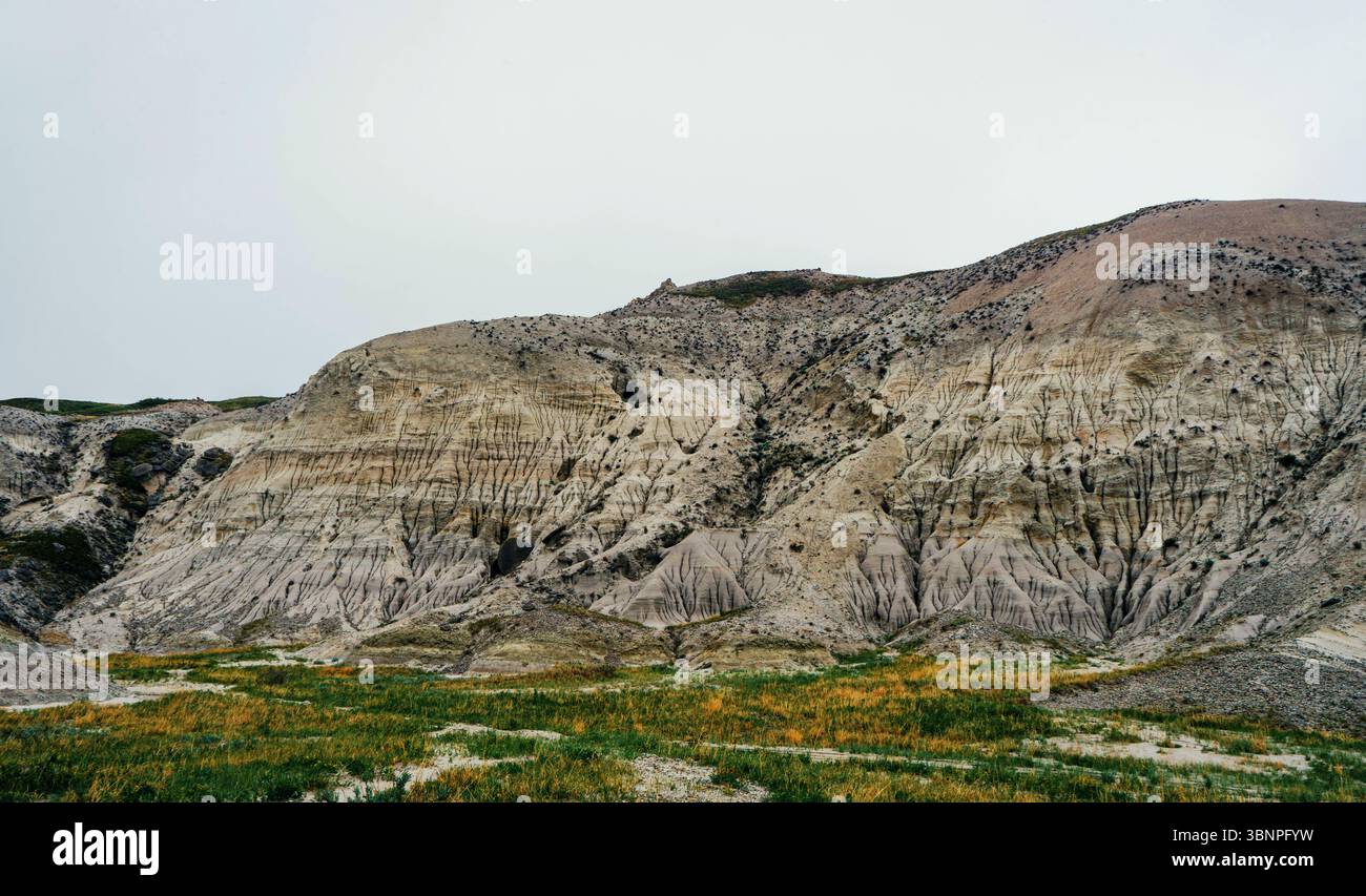 Exposed cliffs and weathered ridges define the face of White Butte ...