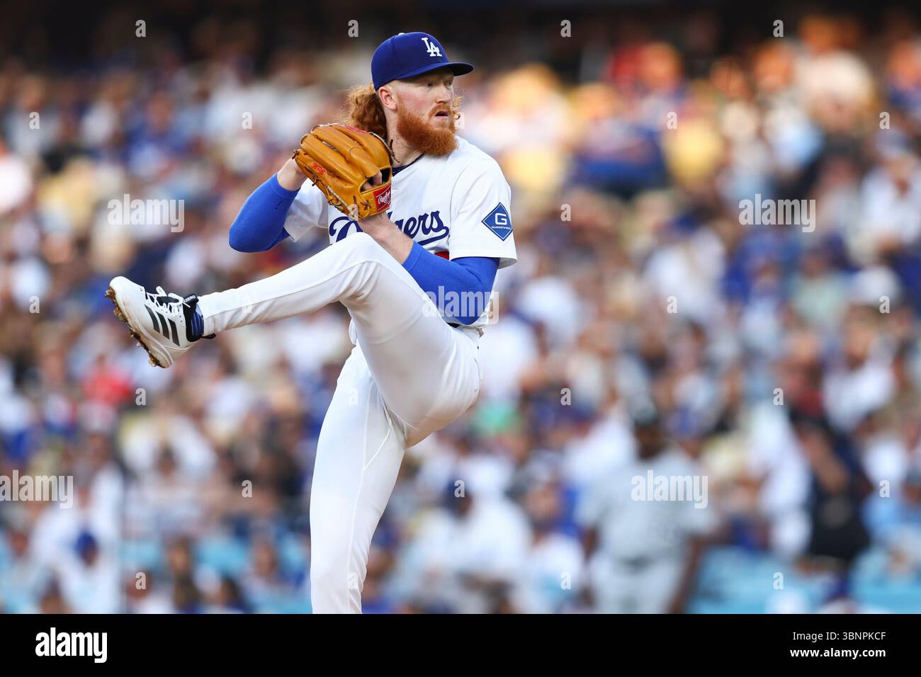 Los Angeles Dodgers pitcher Dustin May prepares to throw to a Chicago ...