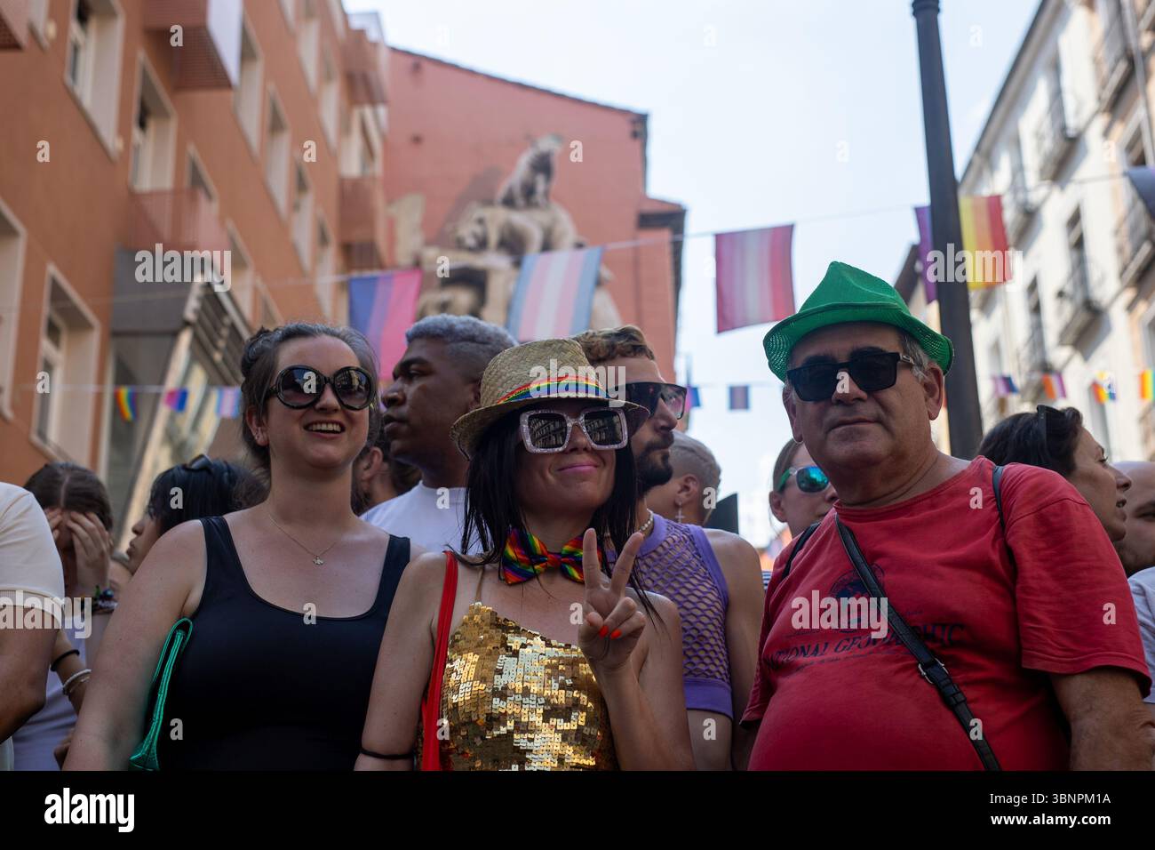 A group of people enjoy the traditional high heel race for Madrid Pride ...