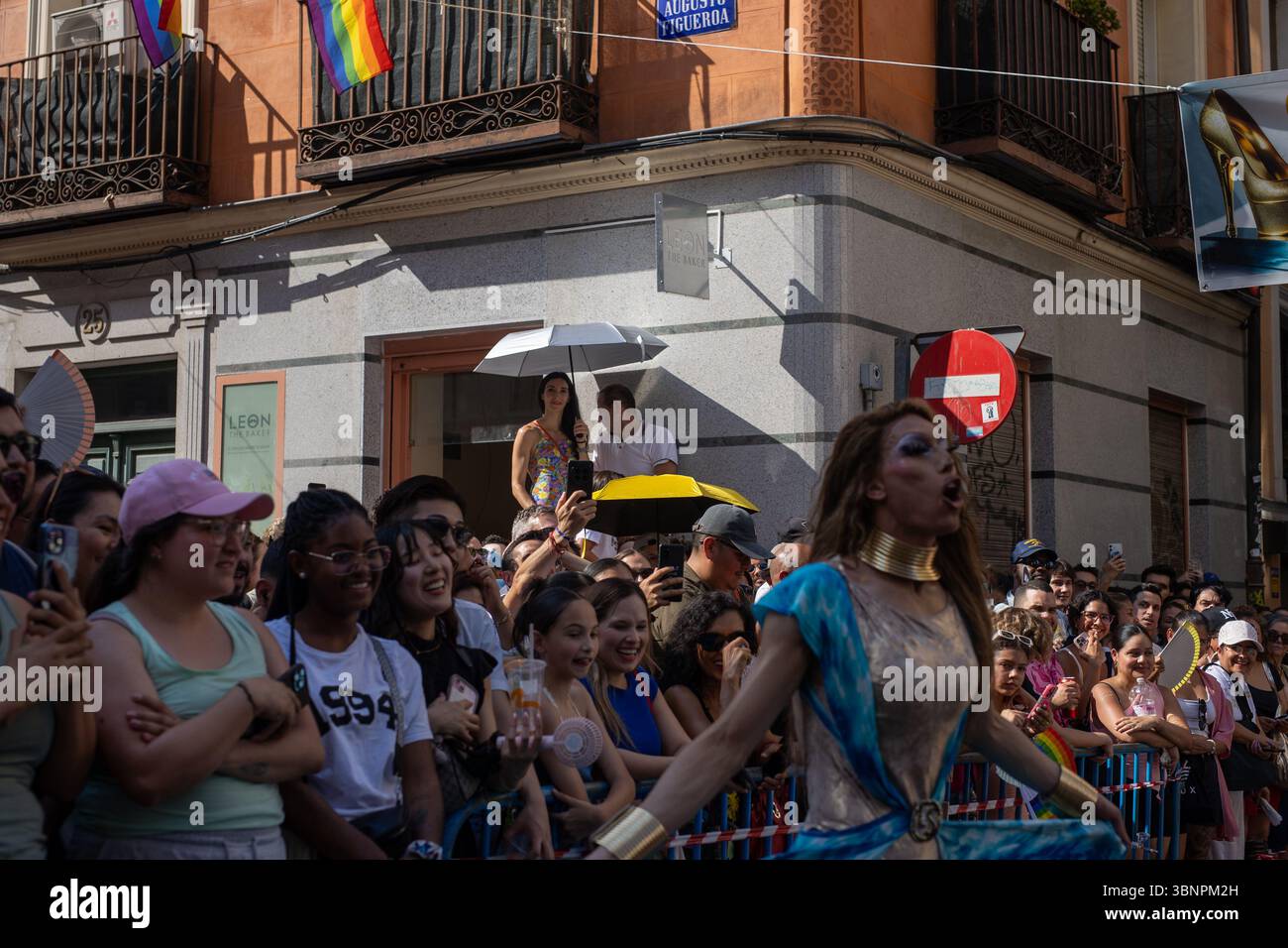 A group of people enjoy the traditional high heel race for Madrid Pride ...