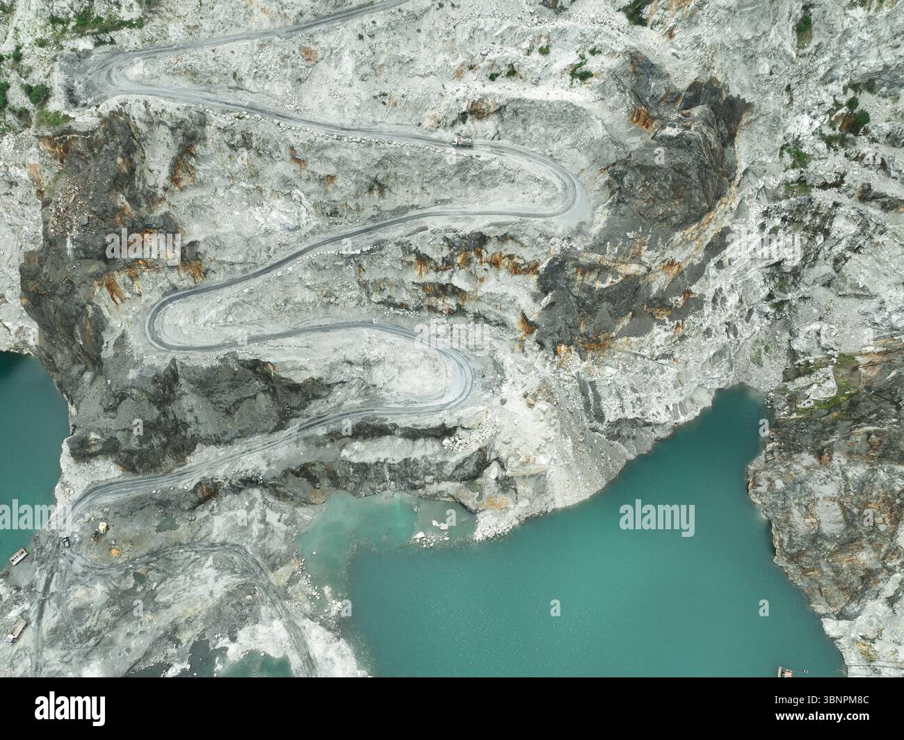 Open pit mine industry. Limestone quarry with backhoe and truck in ...