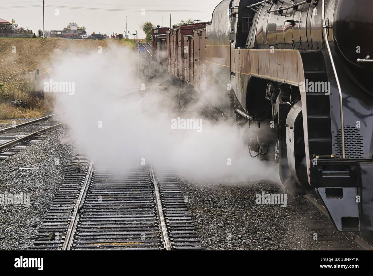An Antique Restored Steam Freight Train Approaching Head on Blowing ...