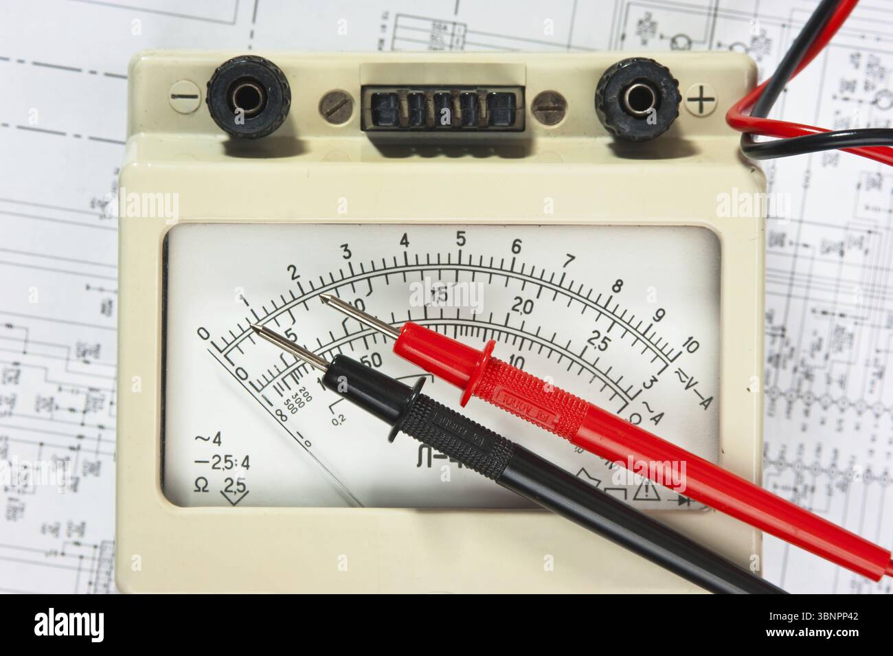 Old multimeter on the wiring diagram Stock Photo - Alamy