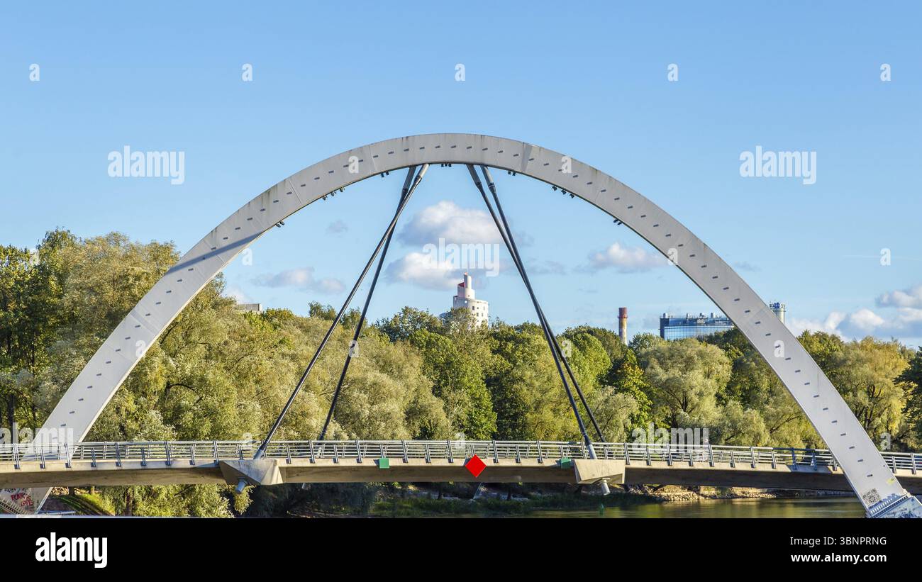 Freedom bridge over Emajogi river in Tartu, Estonia. In the background ...