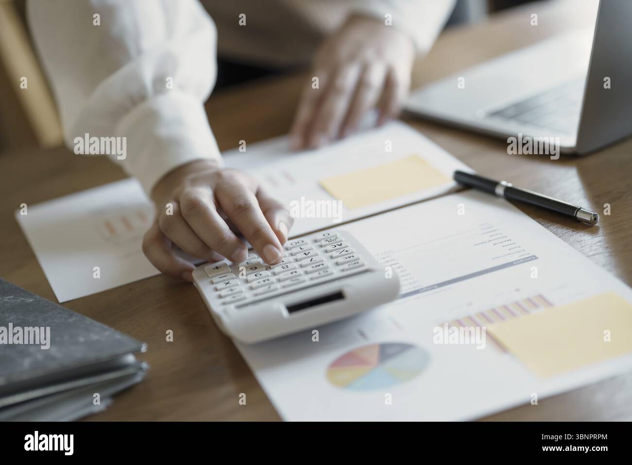 Asian female audit accountant calculating invoice and tax, Financial ...