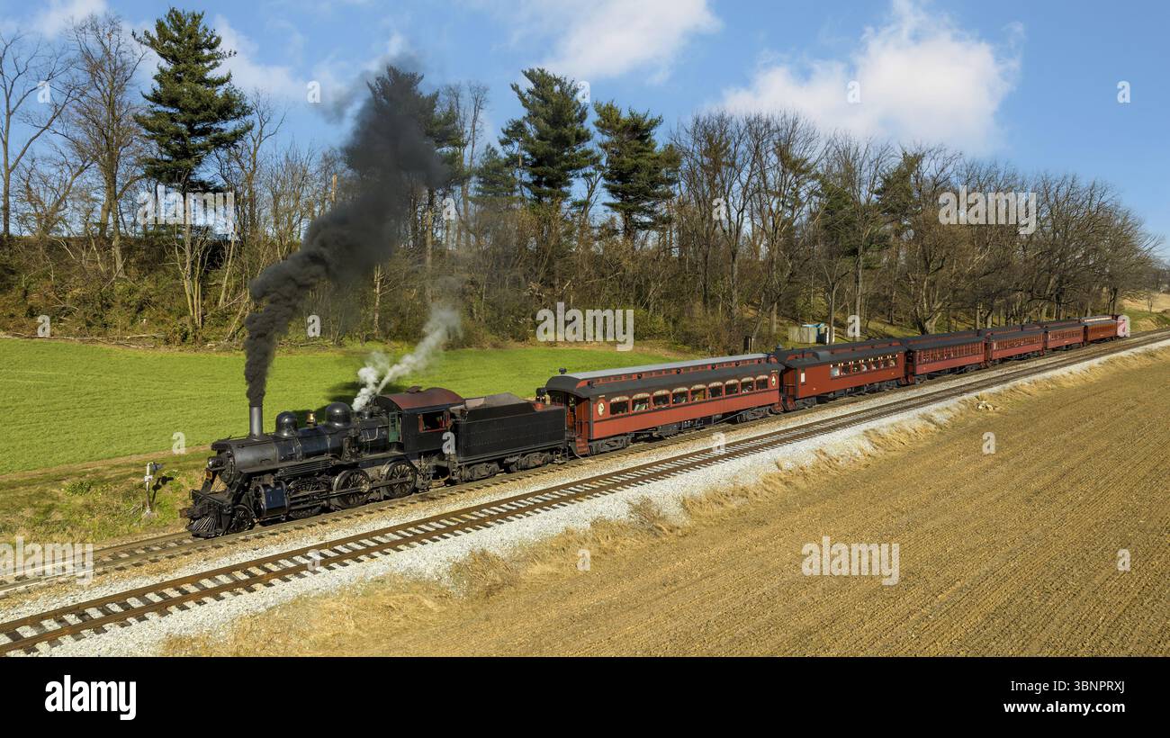 A Drone View of a Restored Steam Passenger Train Traveling Thru ...