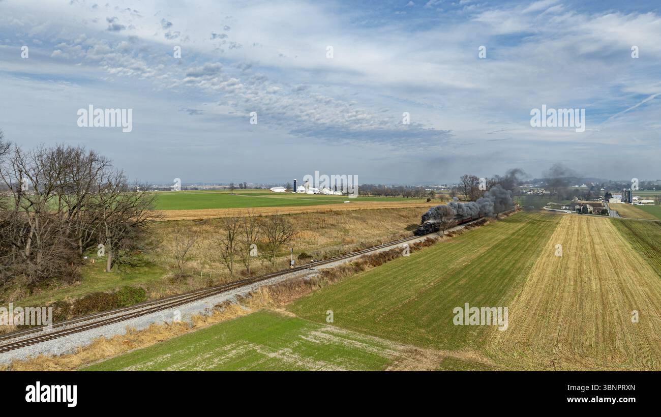 Steam train puffs along tracks hi-res stock photography and images - Alamy