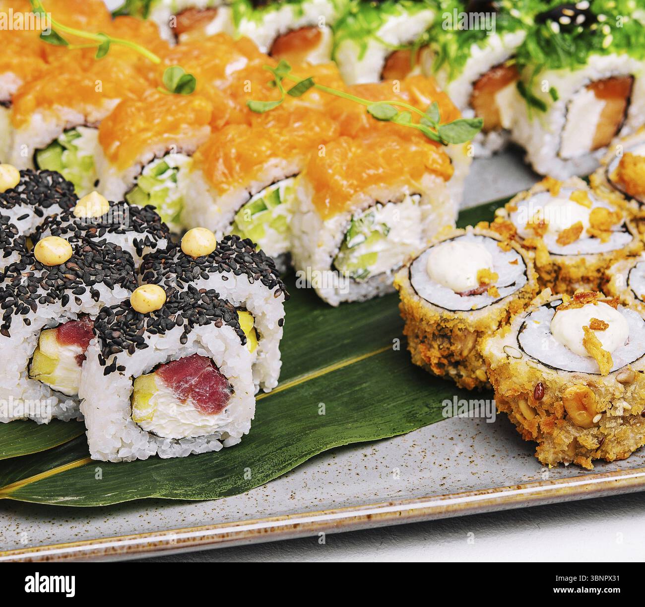 food still-life, Four different types of sushi rolles Stock Photo - Alamy