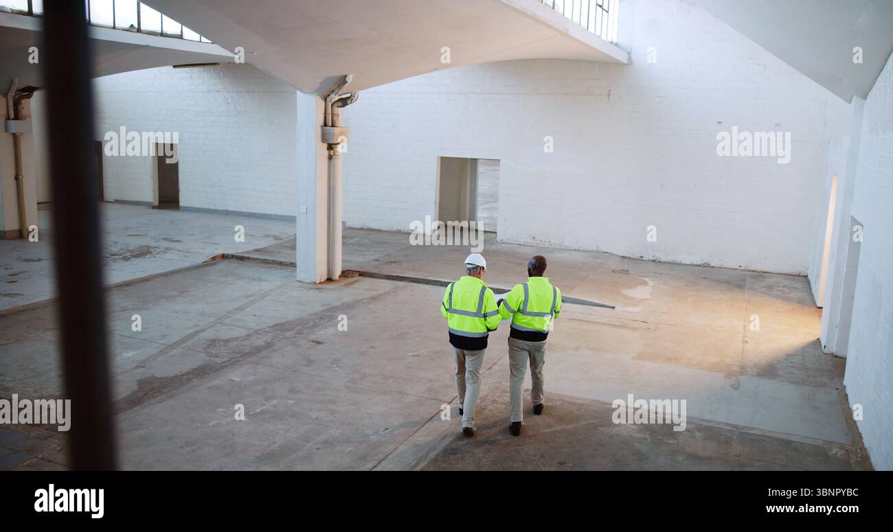 Men, architect and back with blueprint, discussion and review for ...