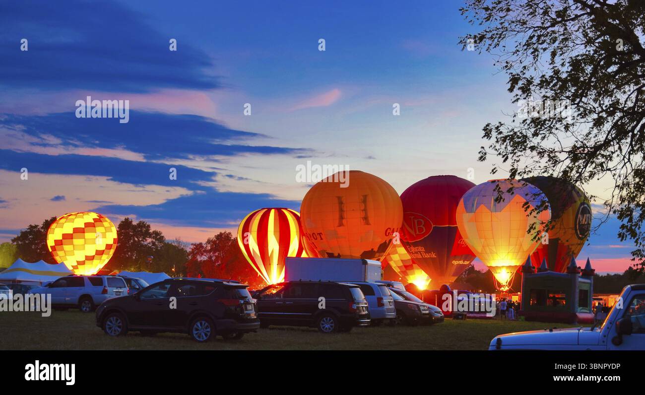 Multiple Hot Air Balloon Glow as Balloons Fire There Propane Tanks and ...