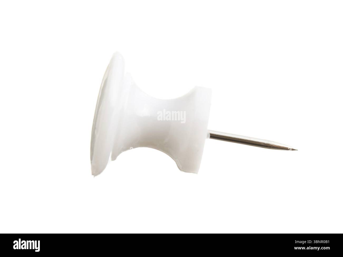 White pushpin isolated on white background Stock Photo - Alamy