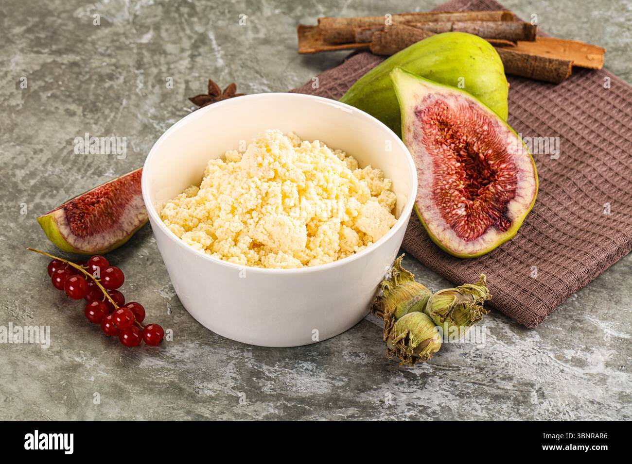 Delicous sheep cottage cheese curd served fig Stock Photo - Alamy