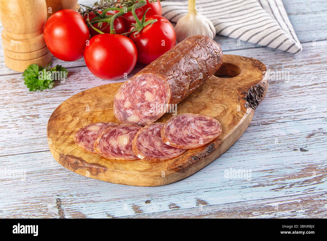 Salchichon pork cured sausages with parmesan cheese Stock Photo - Alamy