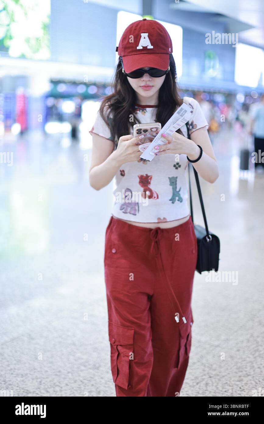 Chinese actress and singer Li Xiaolu appears at airport in Shanghai ...