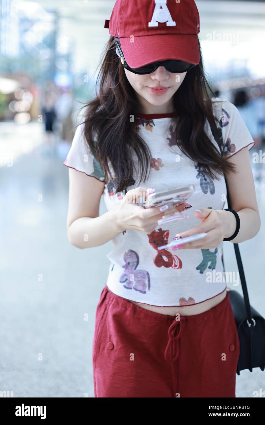 Chinese actress and singer Li Xiaolu appears at airport in Shanghai ...
